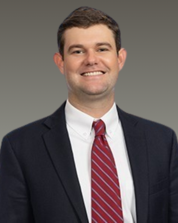 William McVicker Canva Headshot - Carr Allison